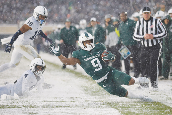 Michigan State Spartans’ Kenneth Walker, Mel Tucker, Michigan ...